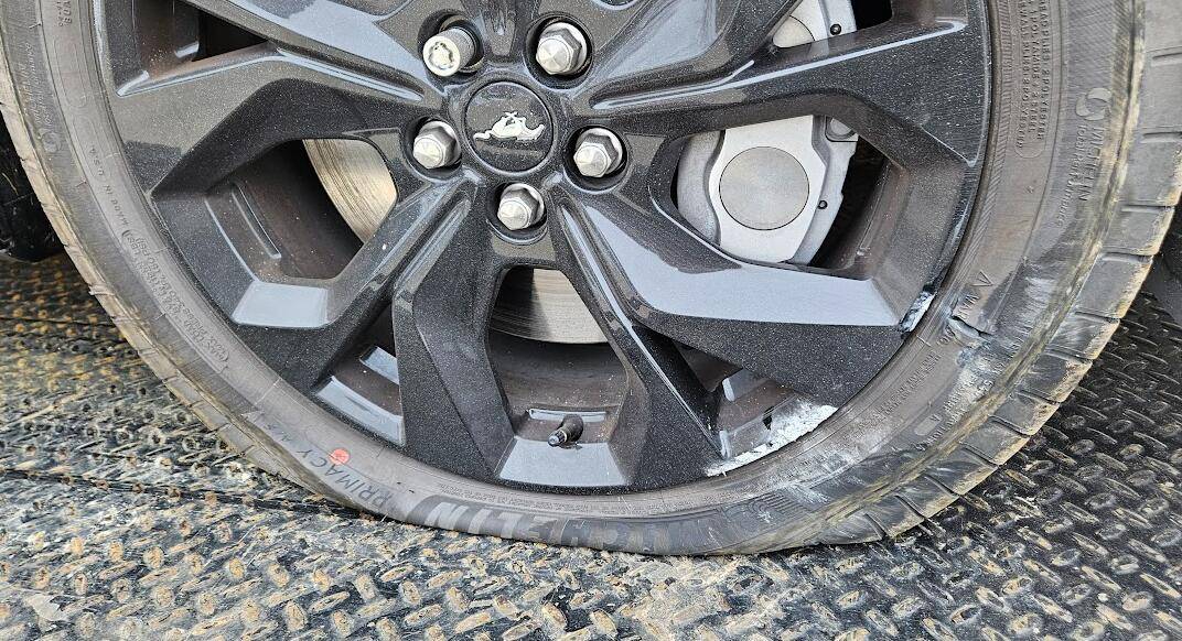 Scratched wheel rim on curb on a leased car. should I fix it ...